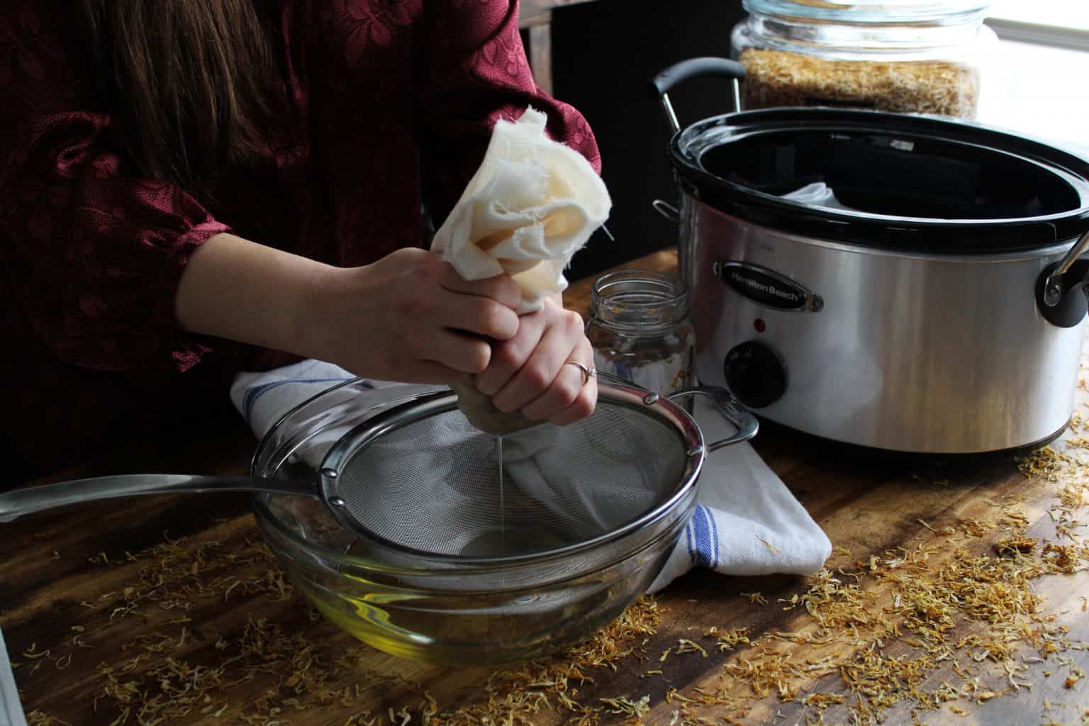 How to Infuse Herbs in Oil | Crockpot Method - Tulips and Twill