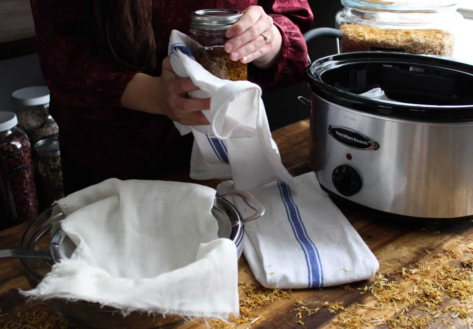 How to Infuse Herbs in Oil | Crockpot Method - Tulips and Twill